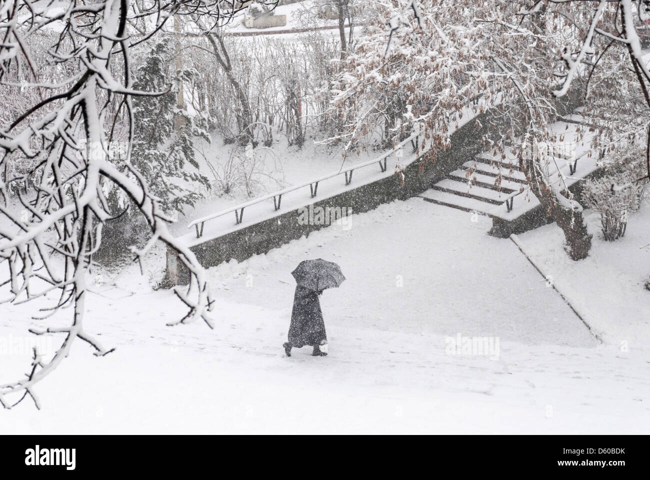 Man walking street snow storm hi-res stock photography and images - Alamy