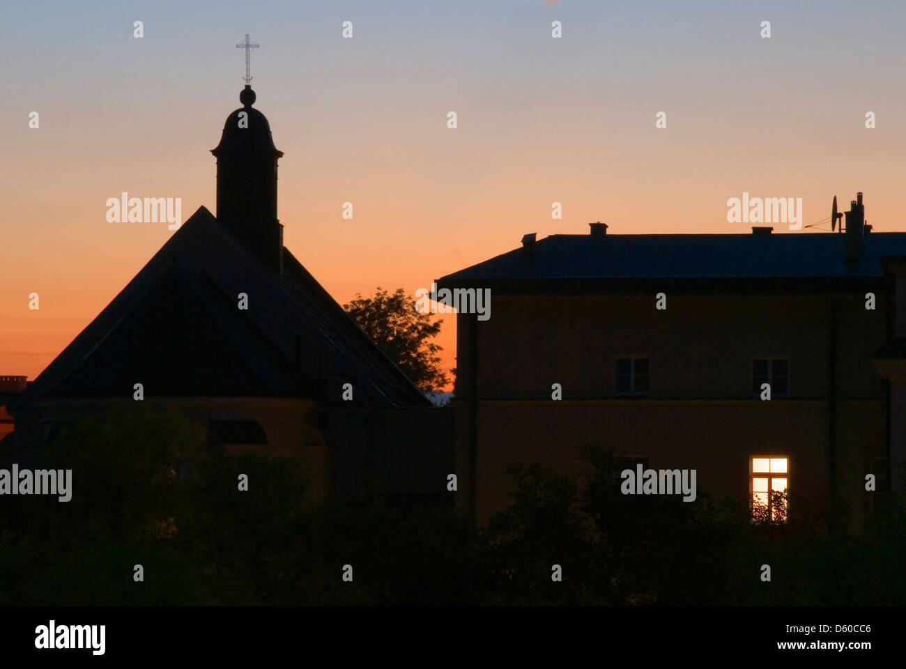 Church buildings at sunset Stock Photo - Alamy
