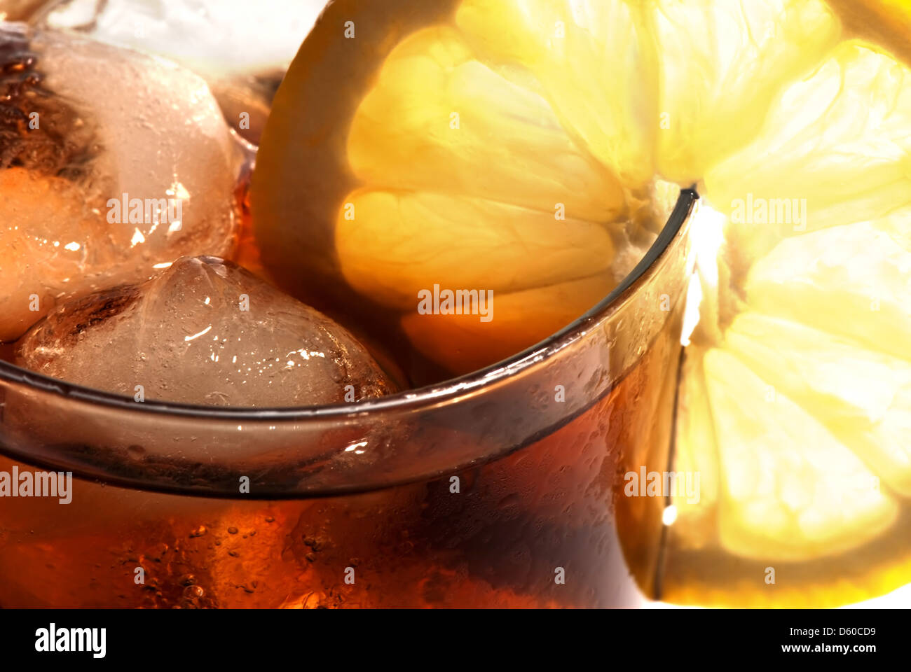 Cold glass of cola with lemon slice Stock Photo - Alamy