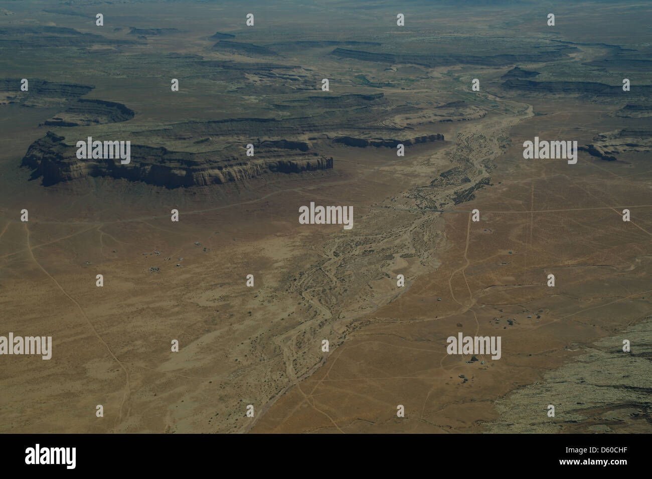 Aerial view, south towards Oljato Mesa, dry braided stream channel ...