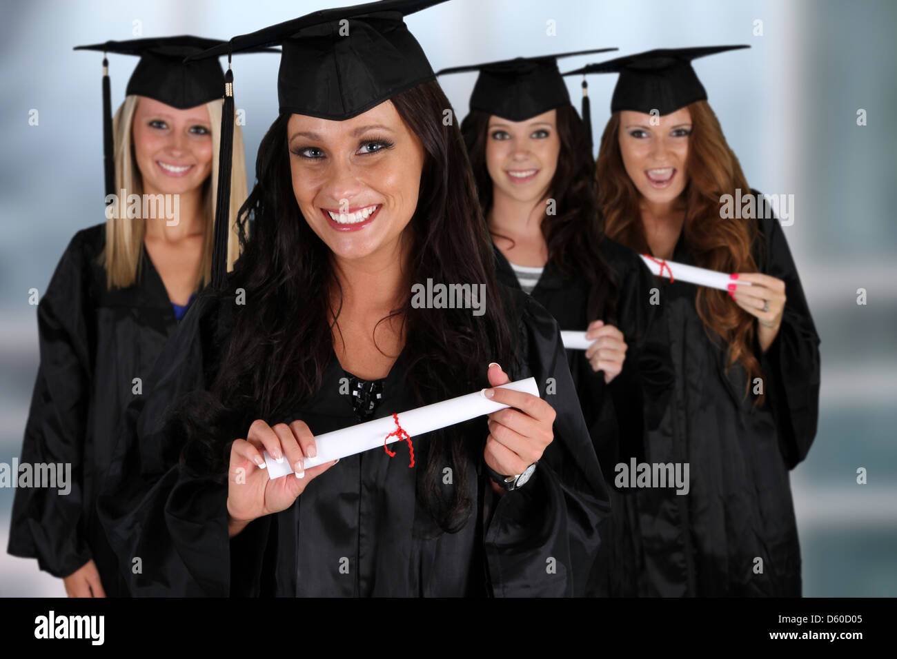 Graduation of a group of women dressed in a black gown Stock Photo - Alamy