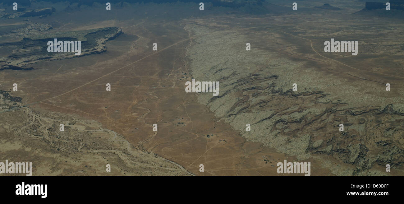 Aerial valley floor view, to Oljato Mesa, braided stream channel ...