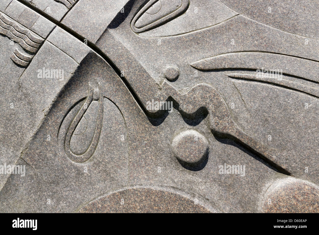 Granite stone tragical face Stock Photo - Alamy