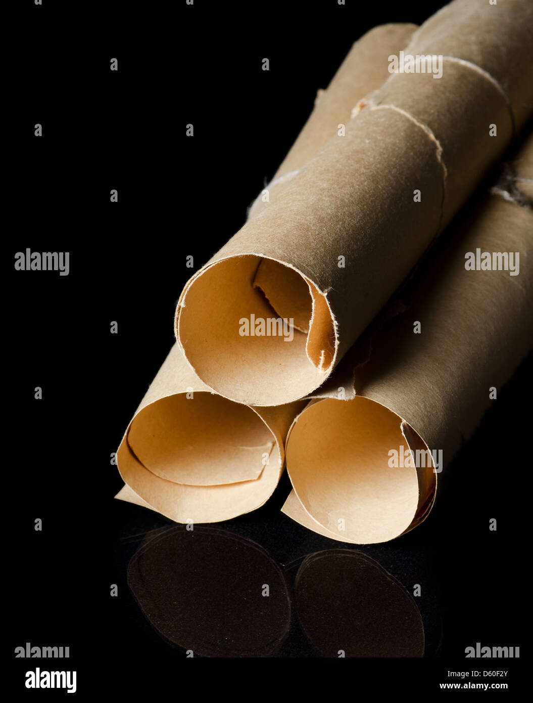 Many scrolls on black background Stock Photo - Alamy