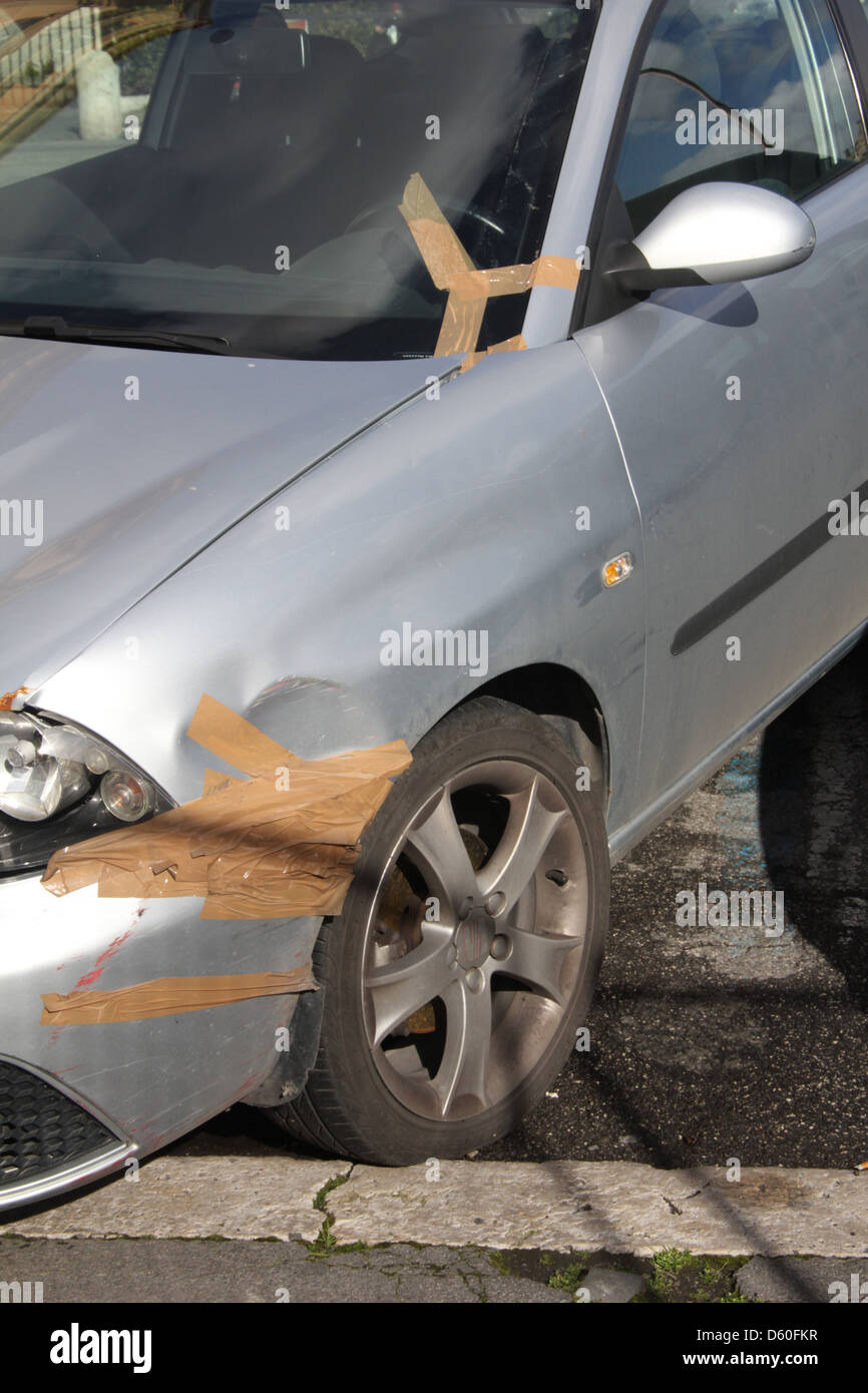 temporary repair for damaged car with adhesive tape Stock Photo - Alamy