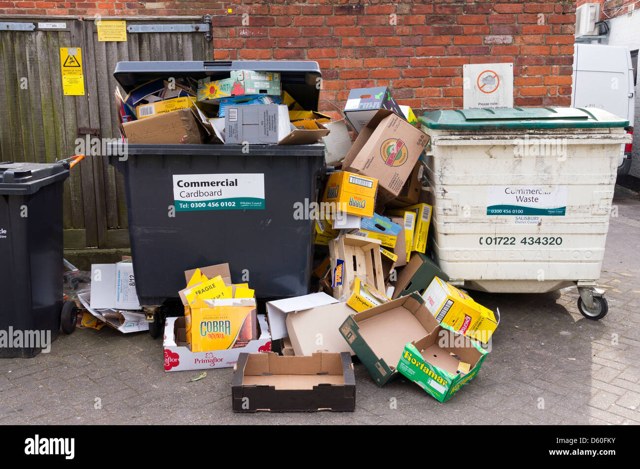 Cardboard for recycling and commercial waste wheelie bins Stock Photo ...
