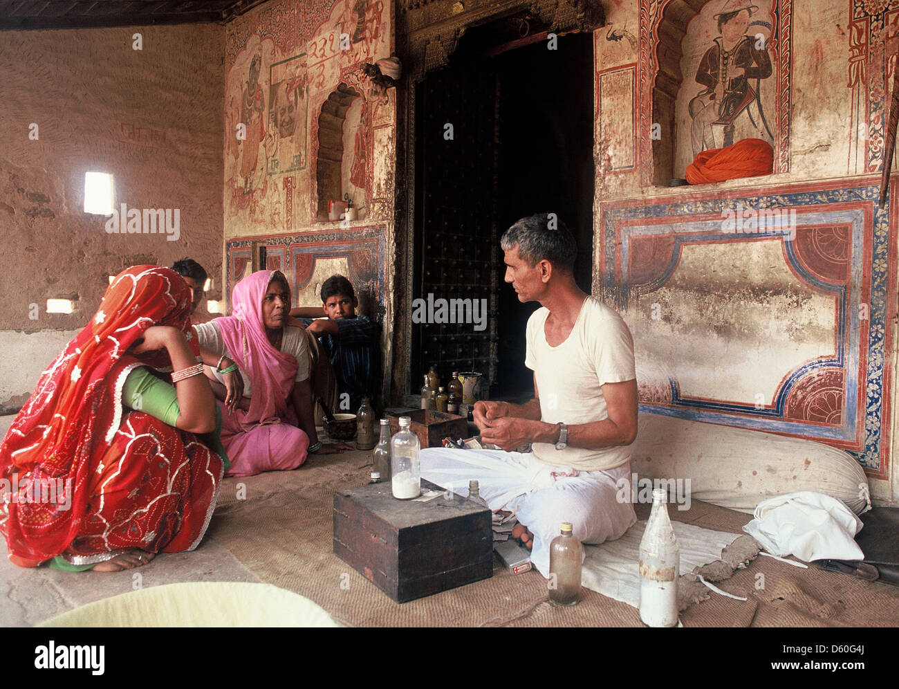 Ayurvedic doctor with his patients ( India Stock Photo - Alamy