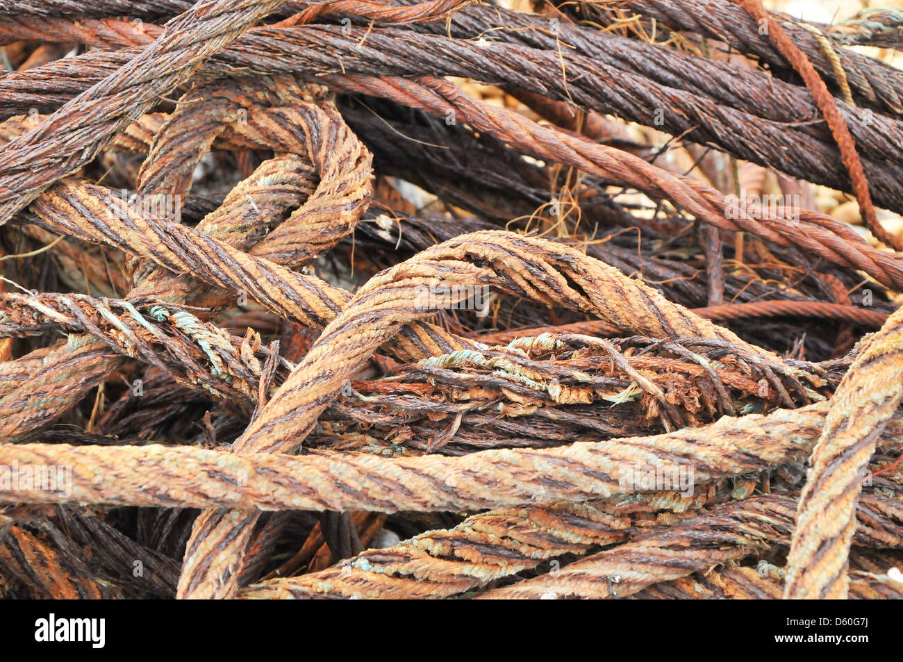 Tangled rusty cable filling the full frame Stock Photo - Alamy