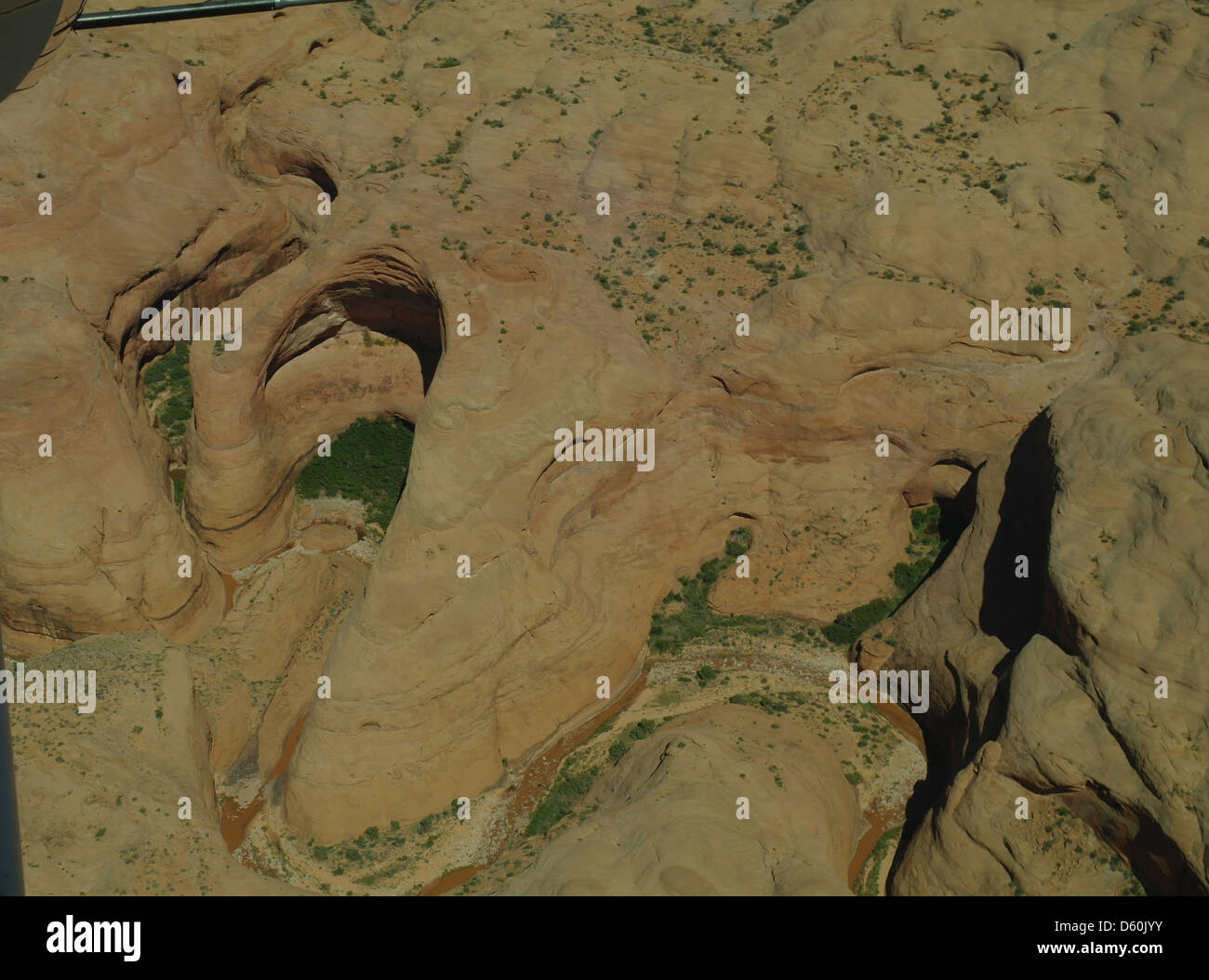 Aerial view deeply entrenched meanders of Aztec Creek incising arid ...