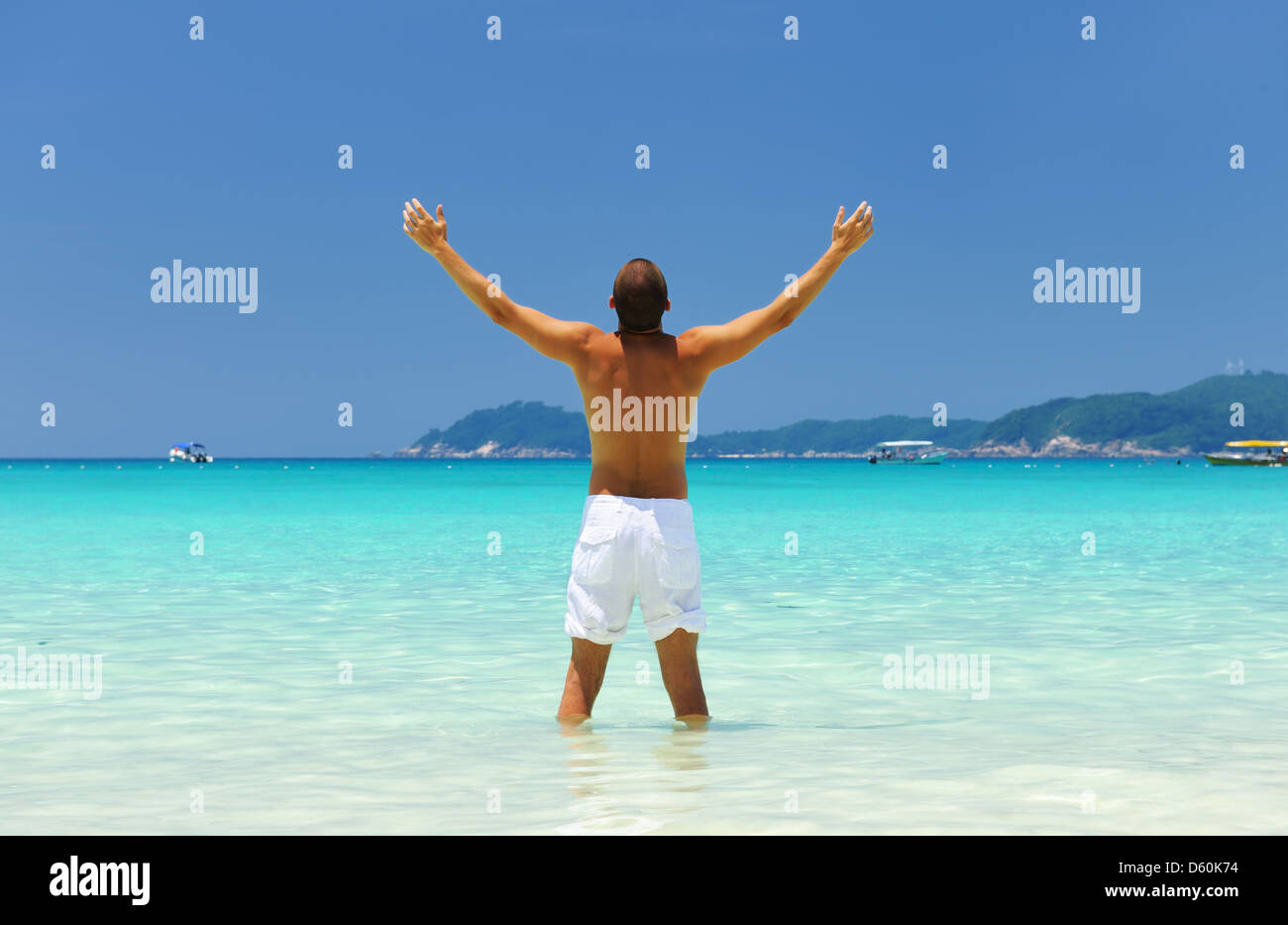 Man at beach Stock Photo - Alamy