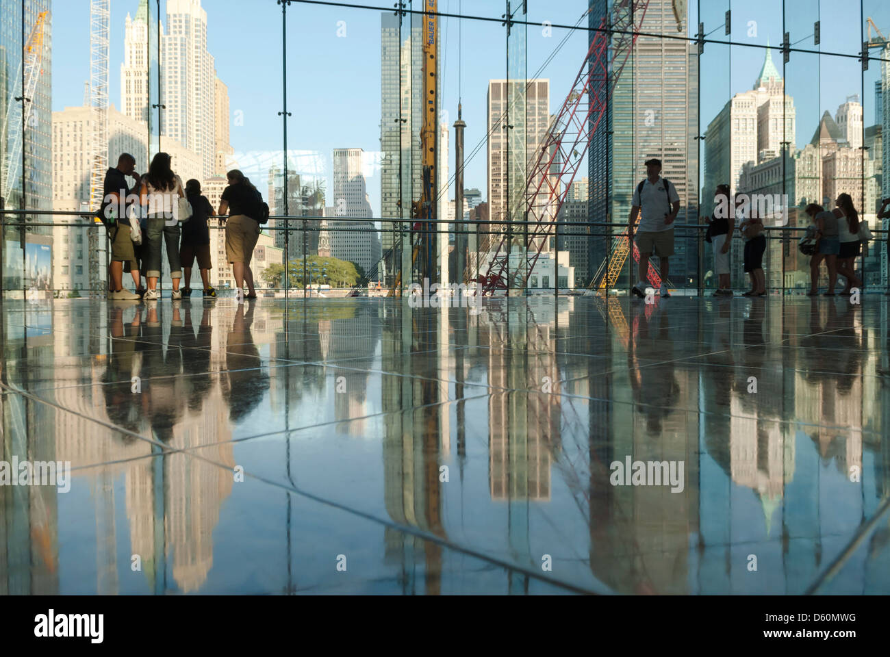 People watching the construction site at ground zero from a neighbor ...