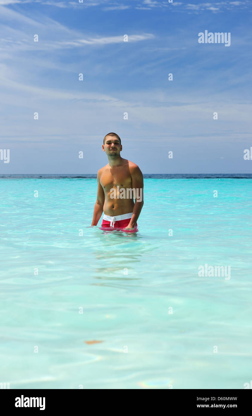 Man at beach Stock Photo - Alamy