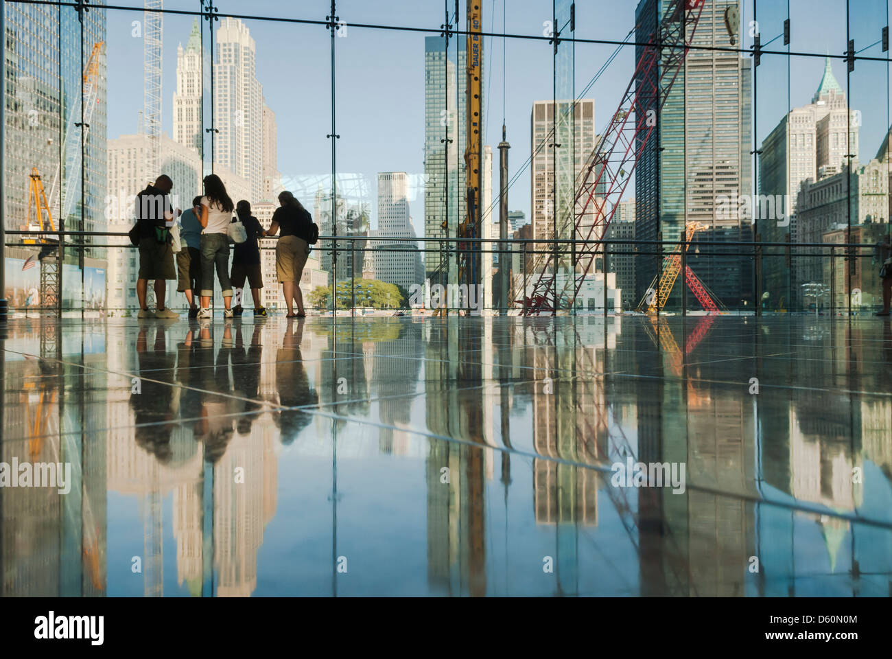 People watching the construction site at ground zero from a neighbor ...