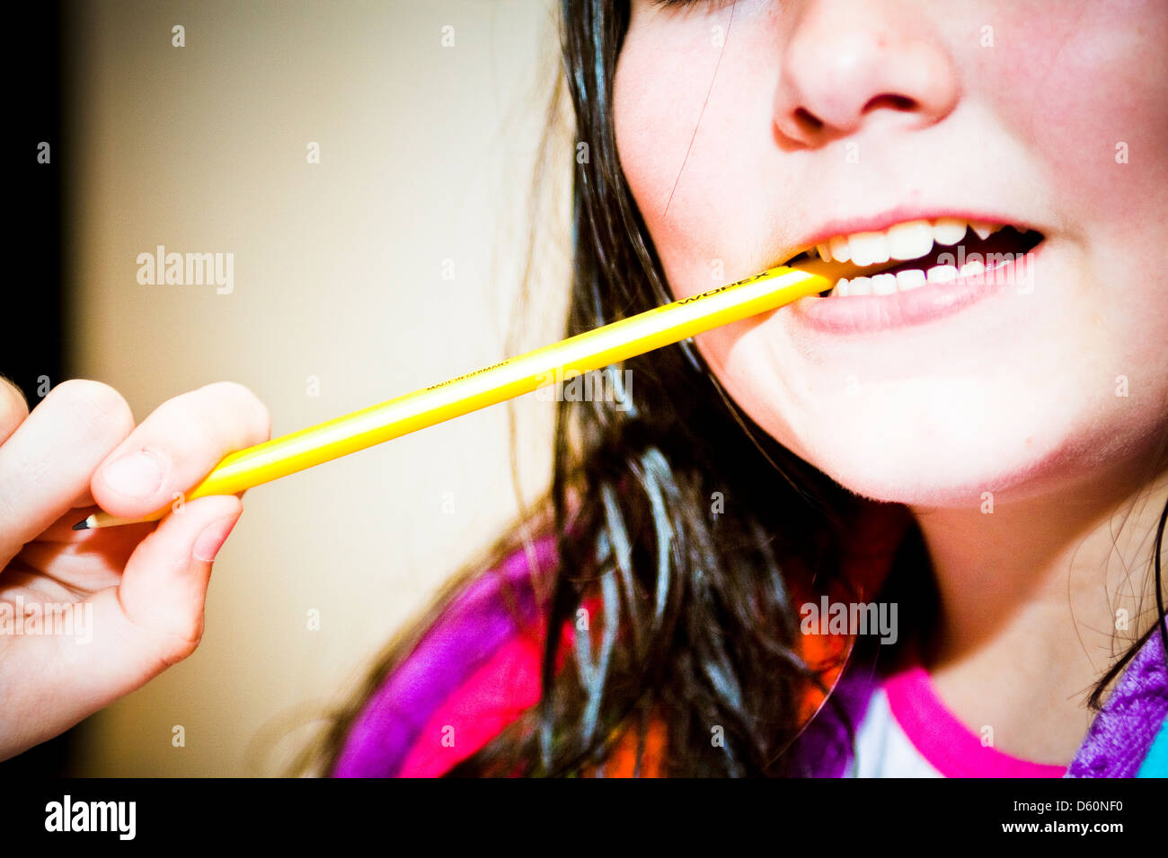 Chewing pencil hi-res stock photography and images - Alamy