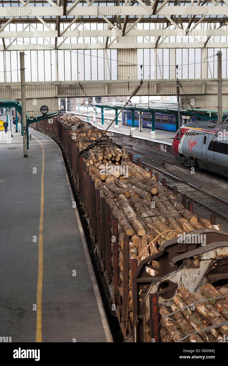 Cut logs on Log train stationary in Carlisle Railway Station, Cumbria ...