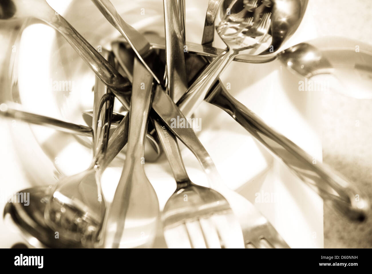 Cutlery drying in plastic rack Stock Photo - Alamy