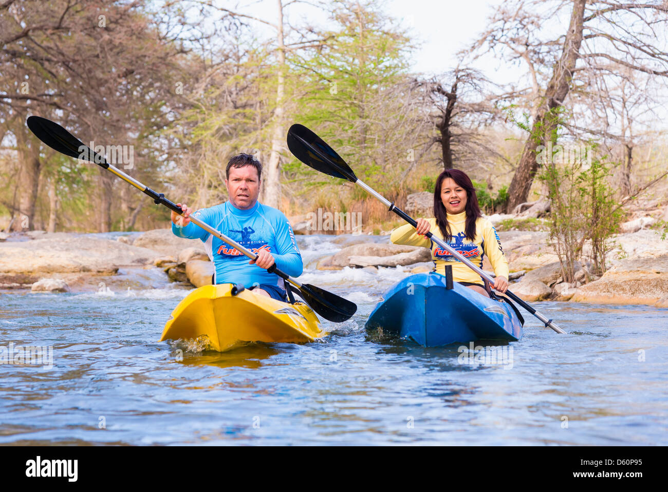 Two people kayaking the Frio River Stock Photo - Alamy