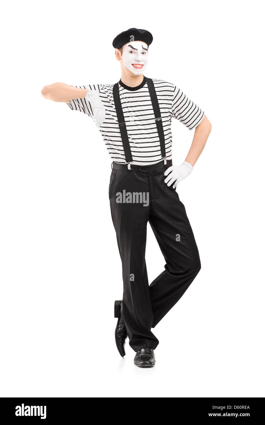 Full length portrait of a male mime artist posing isolated against ...