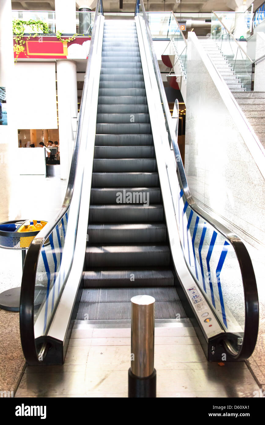 Escalator at airport Stock Photo - Alamy