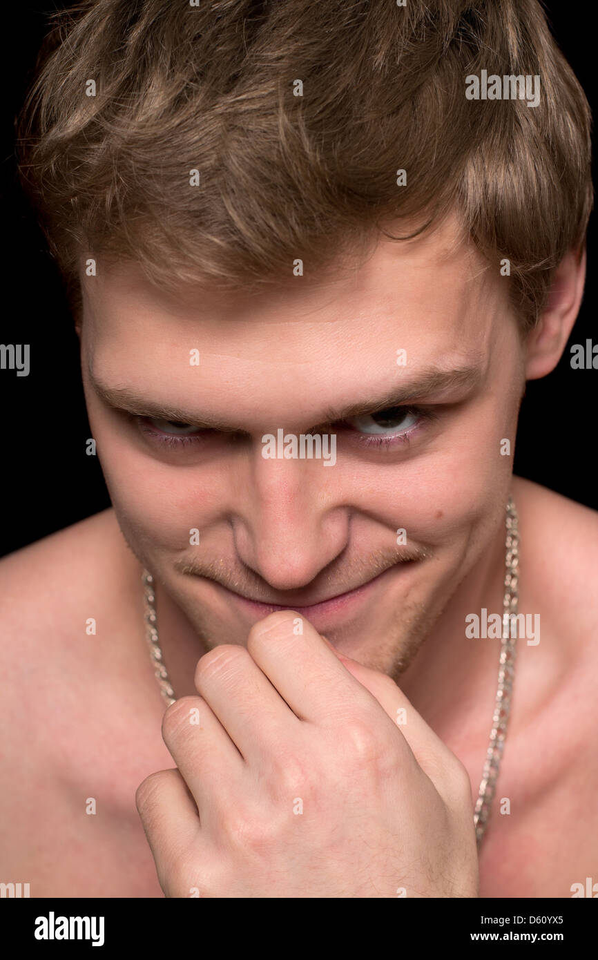 Portrait young man mischievous look hi-res stock photography and images ...