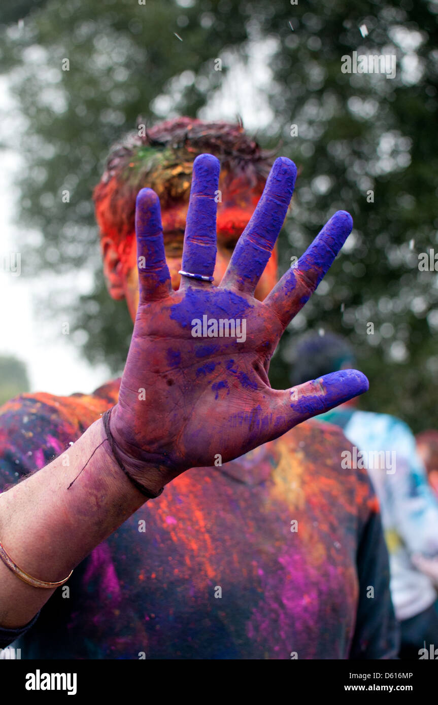 purple hand at Holi Festival Stock Photo - Alamy
