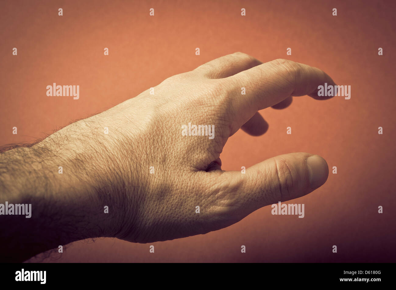 male hand gesture grabbing Stock Photo - Alamy