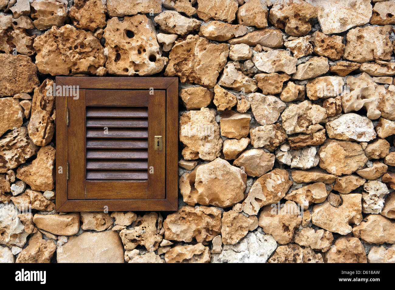 wall of stone with door Stock Photo - Alamy