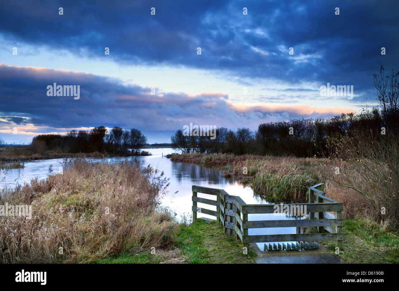 wooden dike on river Stock Photo - Alamy