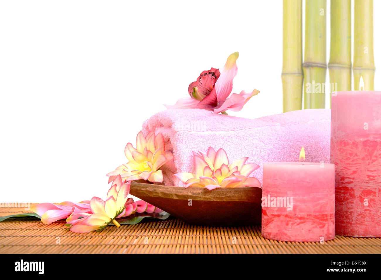 Spa setting in pink tone isolated in white Stock Photo - Alamy