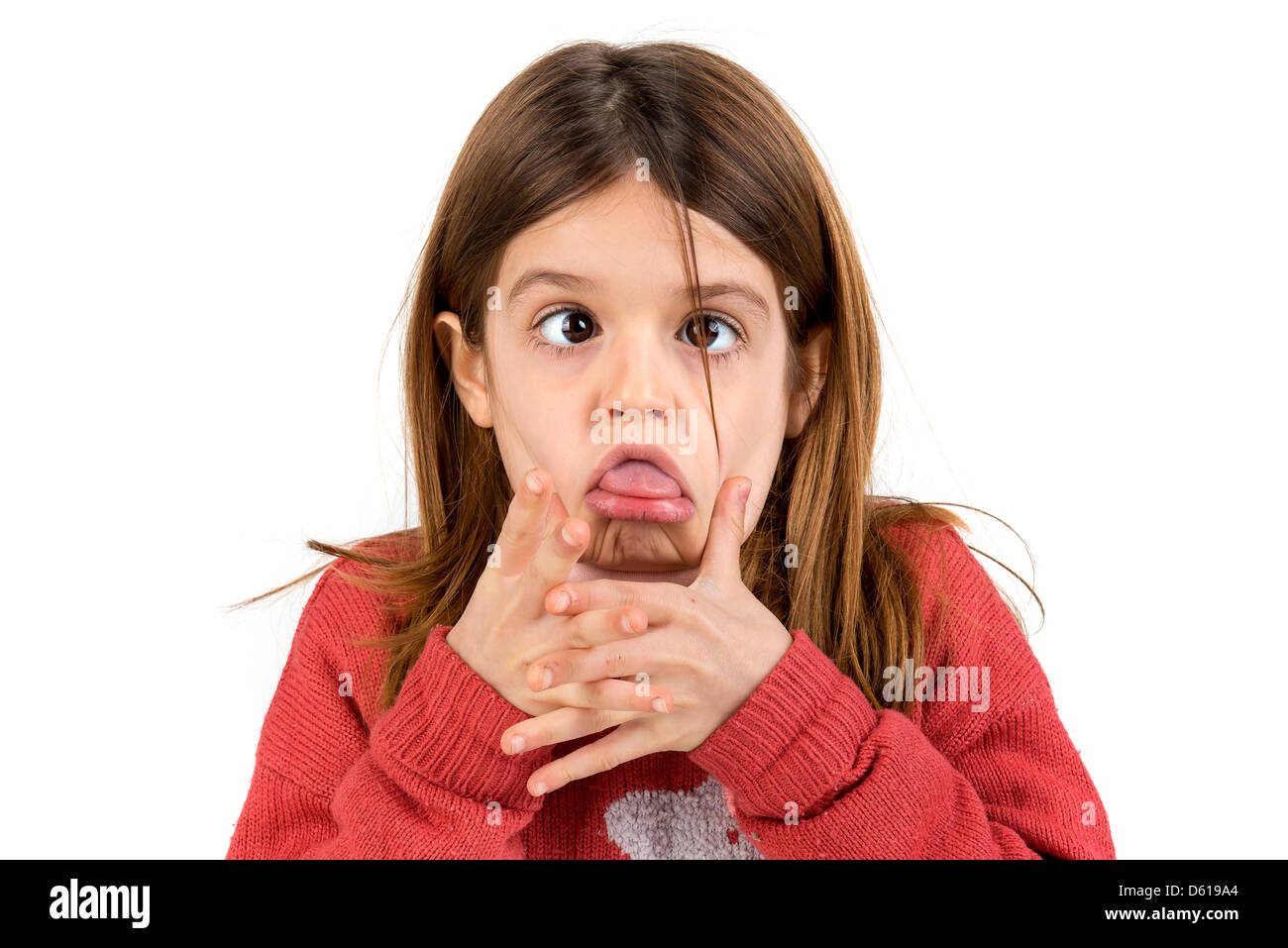 Funny young girl making faces isolated in white Stock Photo - Alamy