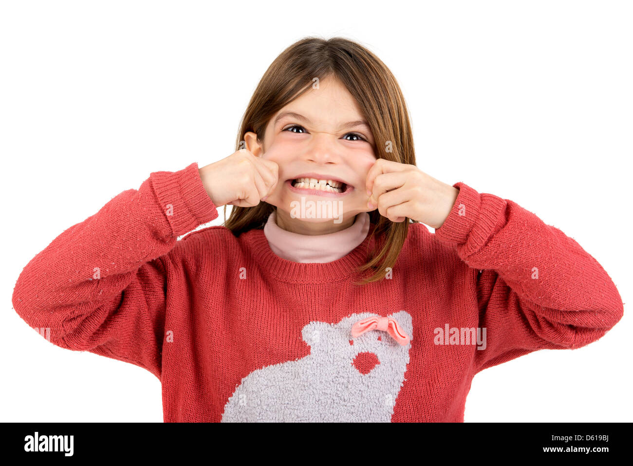 Funny young girl making faces isolated in white Stock Photo - Alamy