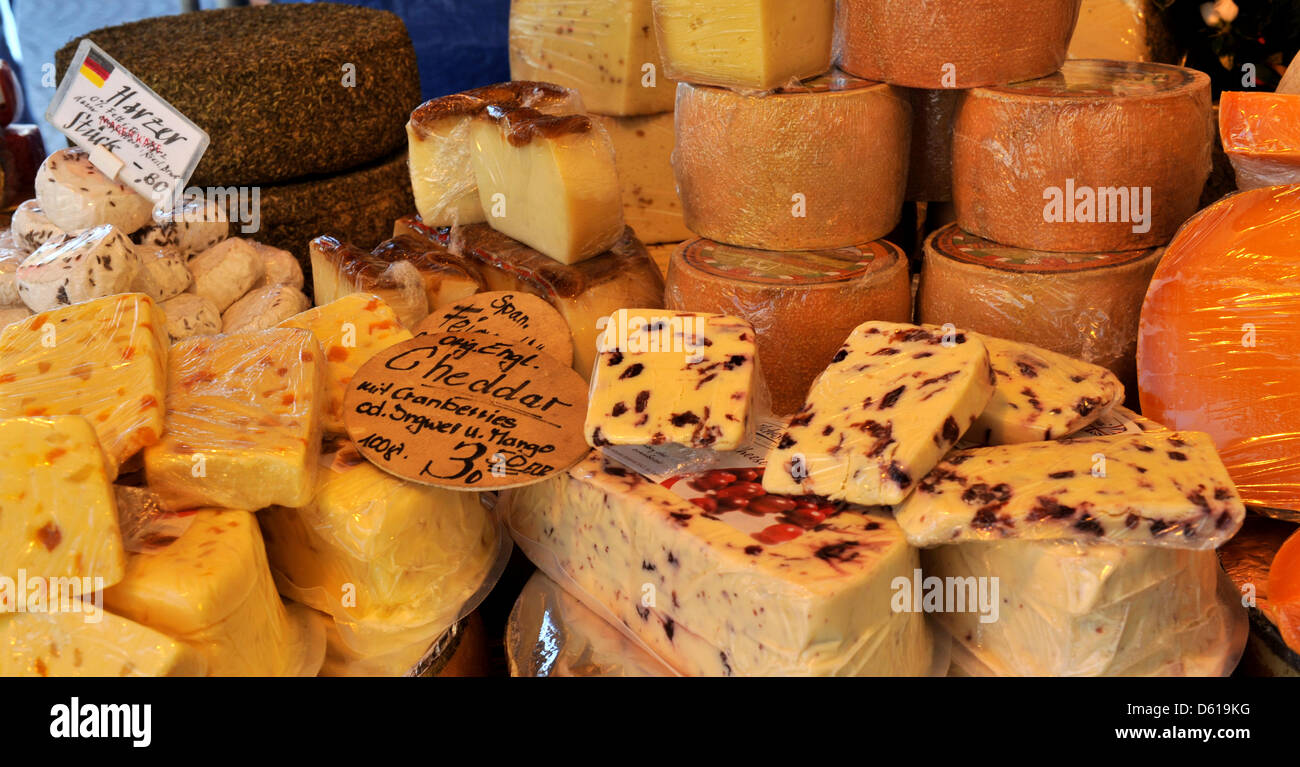 Different varieties of cheese are offered at the Victuals Market in ...