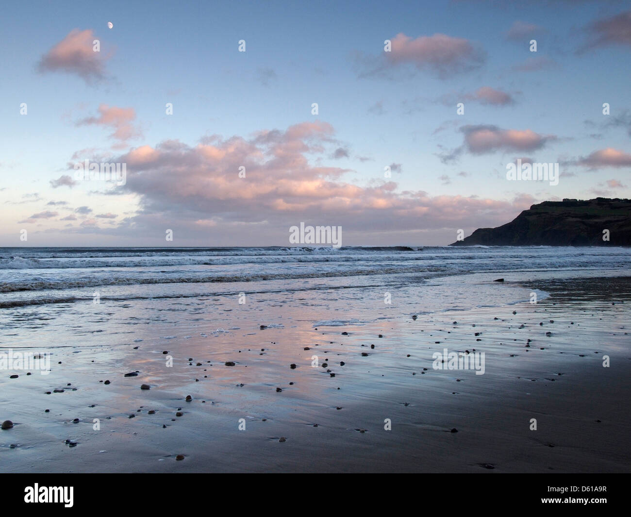 Sunset clouds on beach, Boggle hole, Yorkshire, England Stock Photo - Alamy