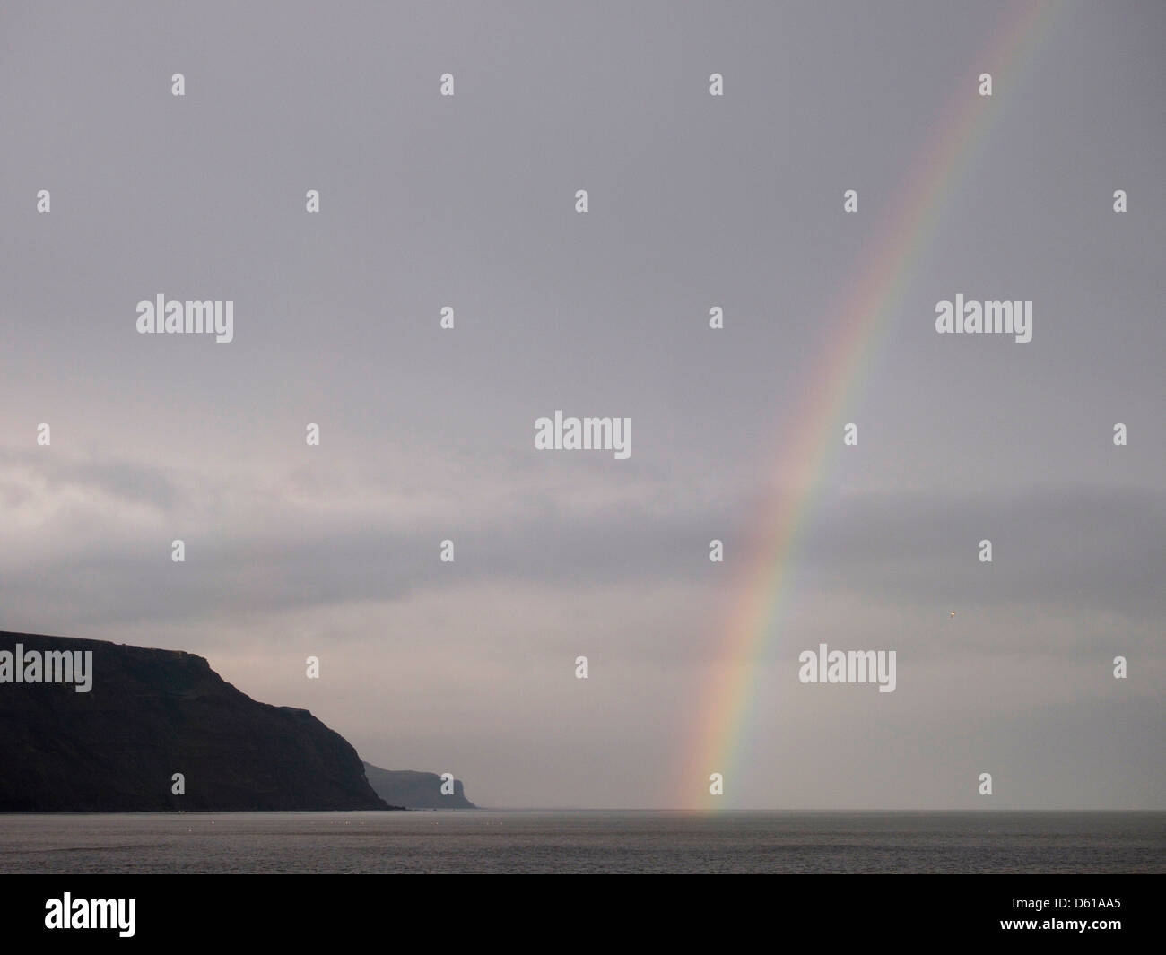 Rainbow over sea, Staithes, Yorkshire, England Stock Photo - Alamy
