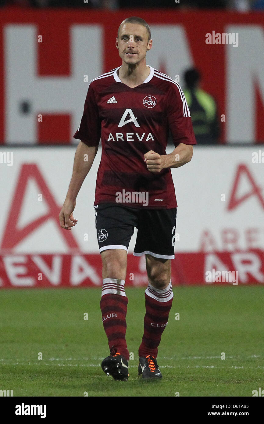 Nuremberg's Timmy Simons (L) celebrates his 2-0 goal during the German ...