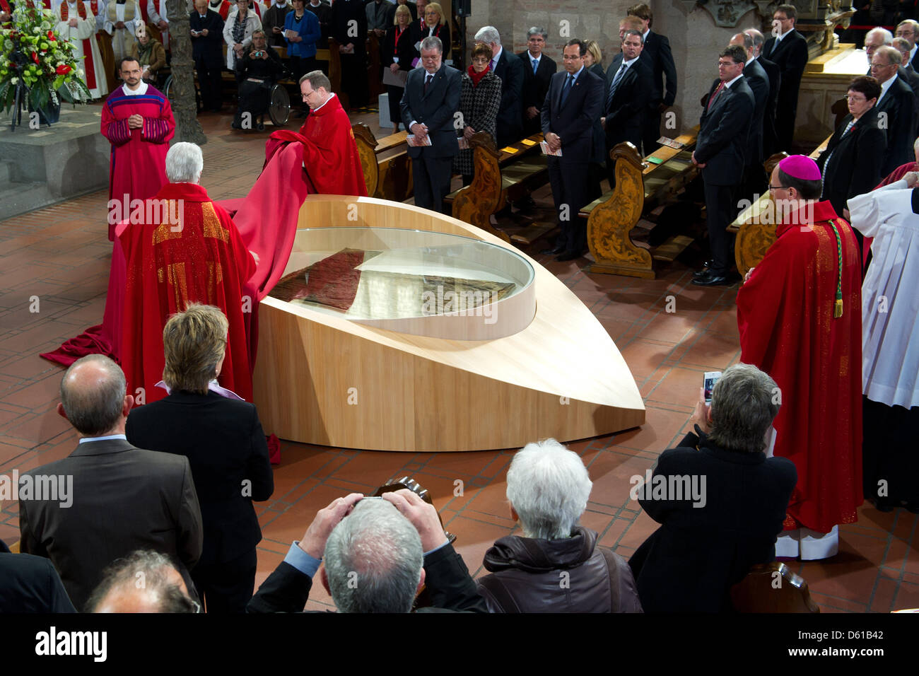The Holy Robe is unveiled during a mass at the cathedral in Trier ...