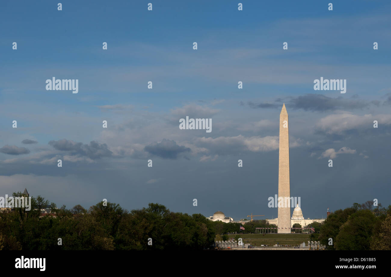 The Washington Monument, a white tower in the form of an obelisk, is ...