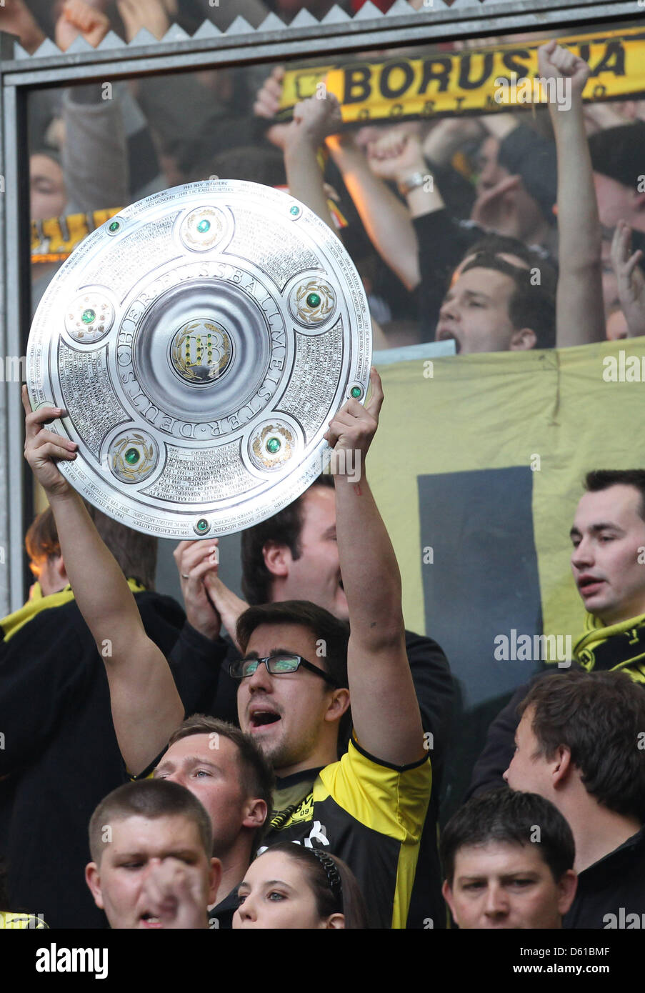 Borussia dortmund supporters celebrate in hi-res stock photography and ...