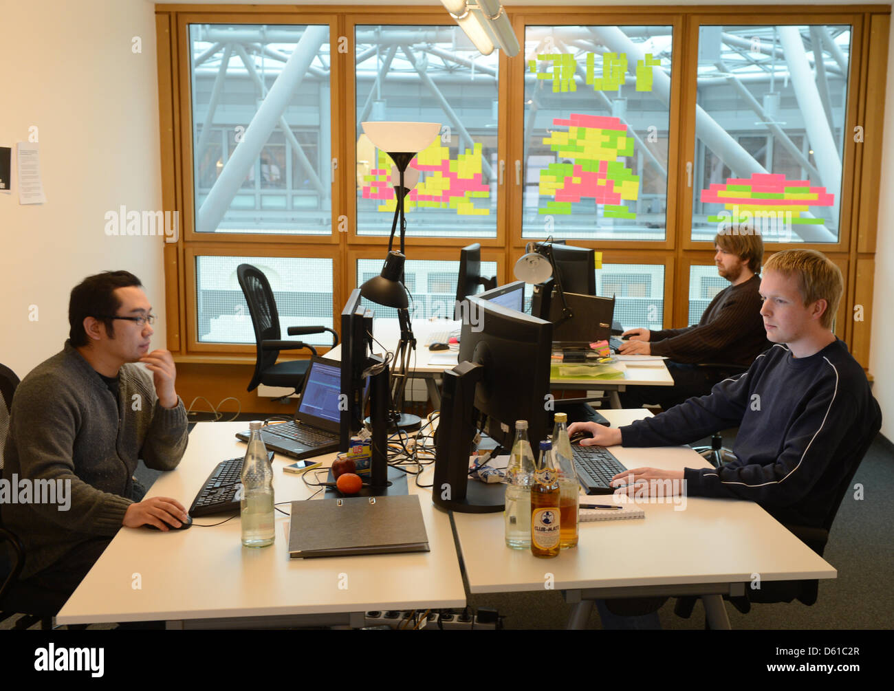 Staff members work at the headquarters of the Rocket Internet company ...