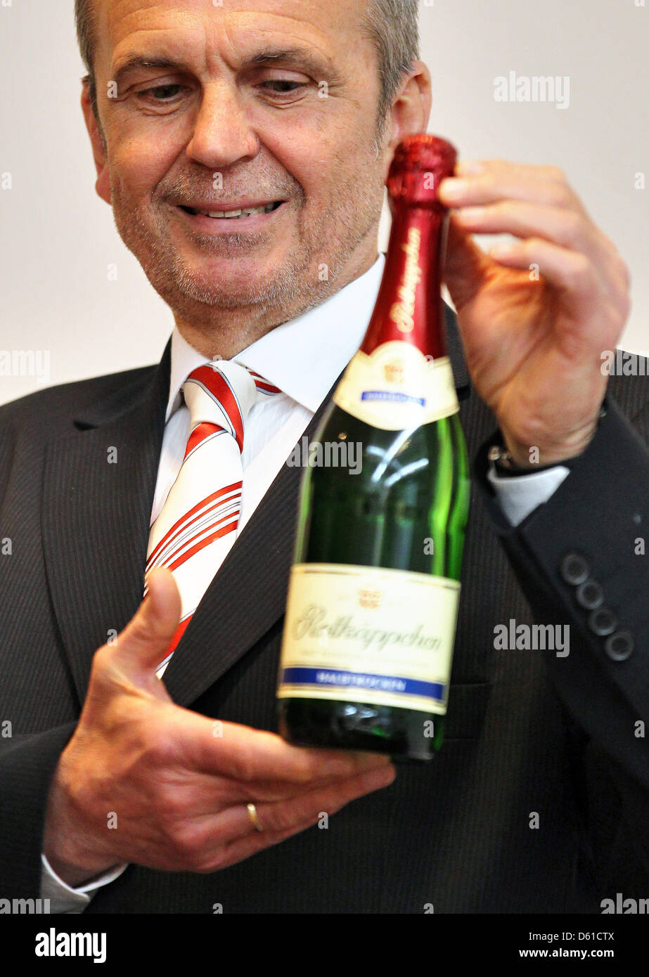 Rotkaeppchen-Mumm director Gunter Heise holds a Rotkaeppchen bottle of ...