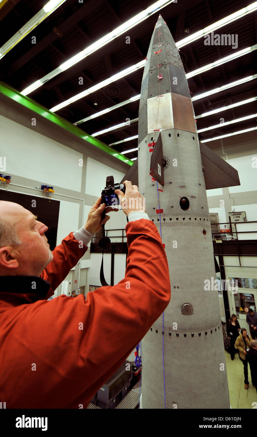 A technician takes a picture of space craft Shefex II during its ...