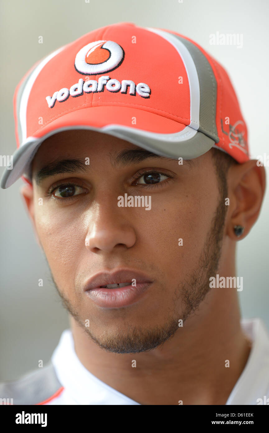 British Formula One driver Lewis Hamilton of McLaren Mercedes talks to ...