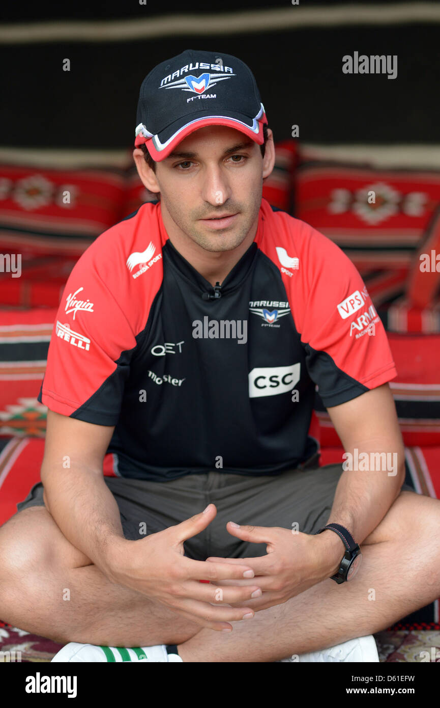German Formula One driver Timo Glock of Marussia sits in a tent in the ...