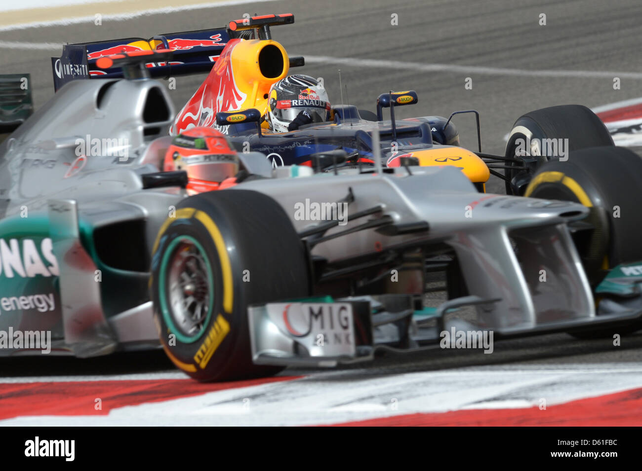 German Formula One driver Michael Schumacher of Mercedes AMG (L) steers ...