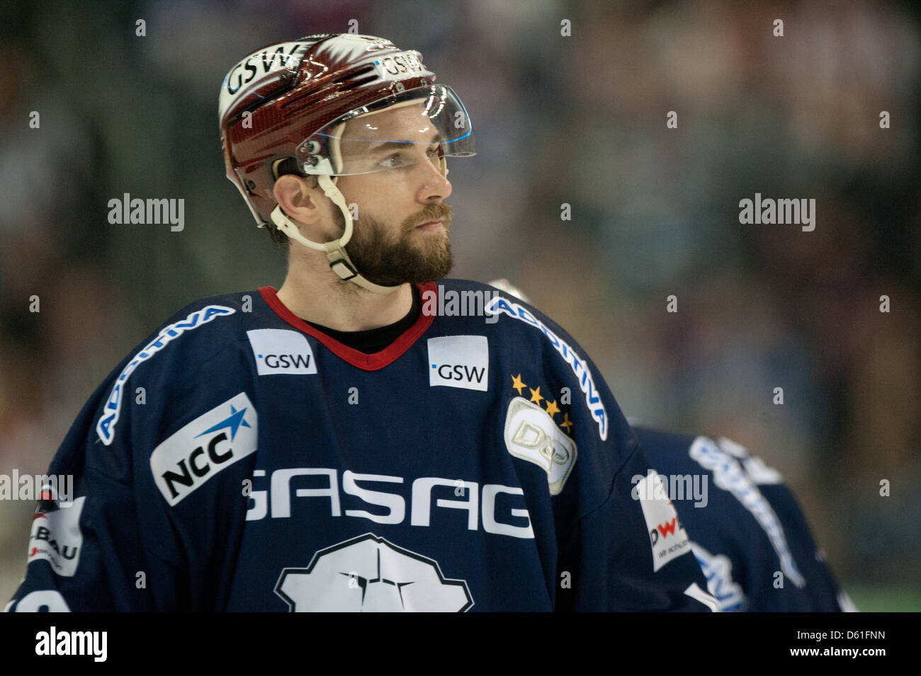 Ice hockey player with helmet off hi-res stock photography and images ...