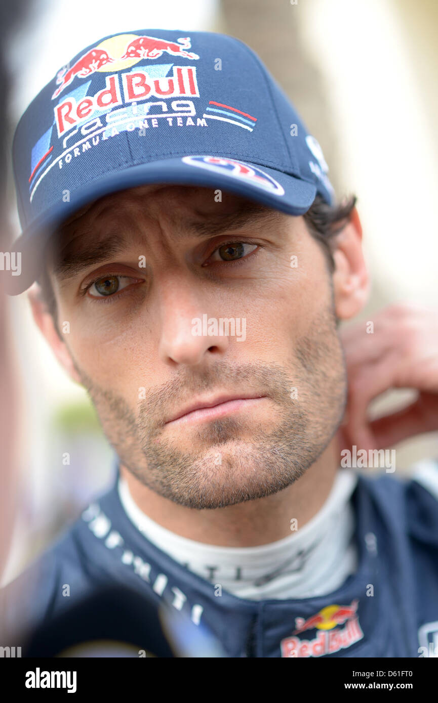 Australian Formula One driver Mark Webber of Red Bull talks to ...