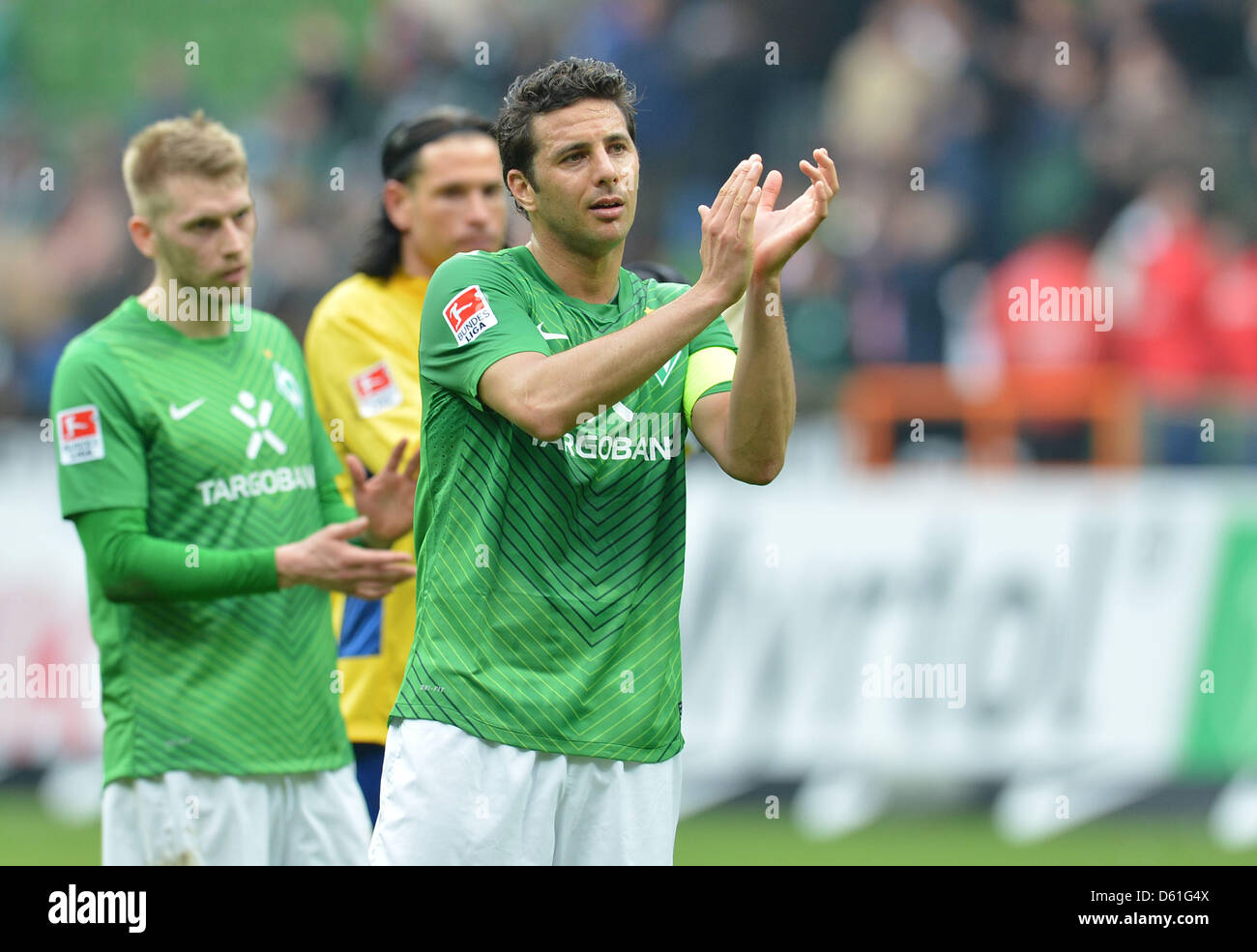 Bremen's Claudio Pizarro and Aaron Hunt (L) are pictured after the ...