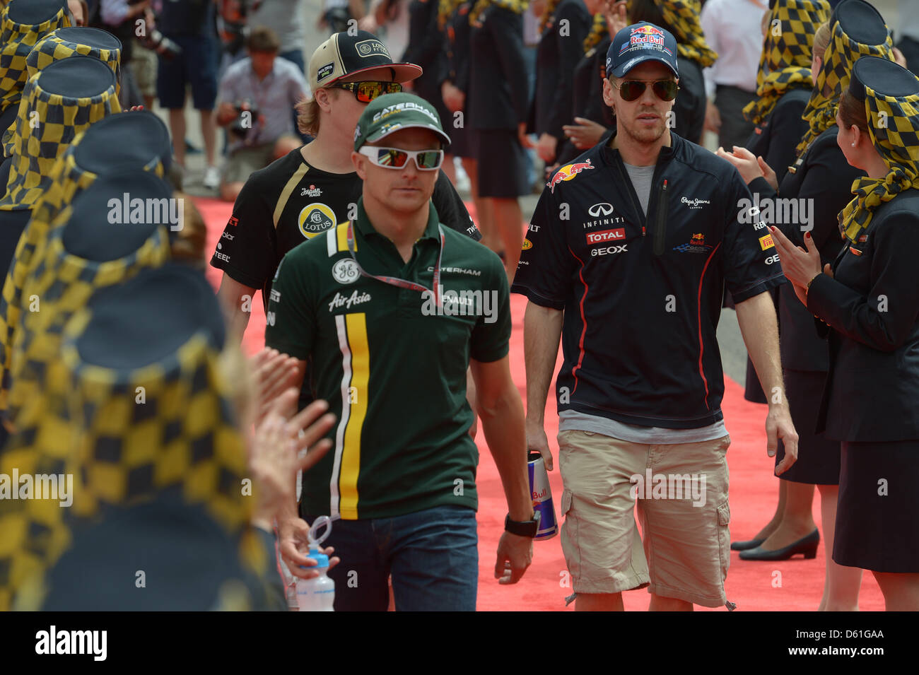 Finnish Formula One driver Kimi Raikkonen (L - R) of Lotus, Finnish ...