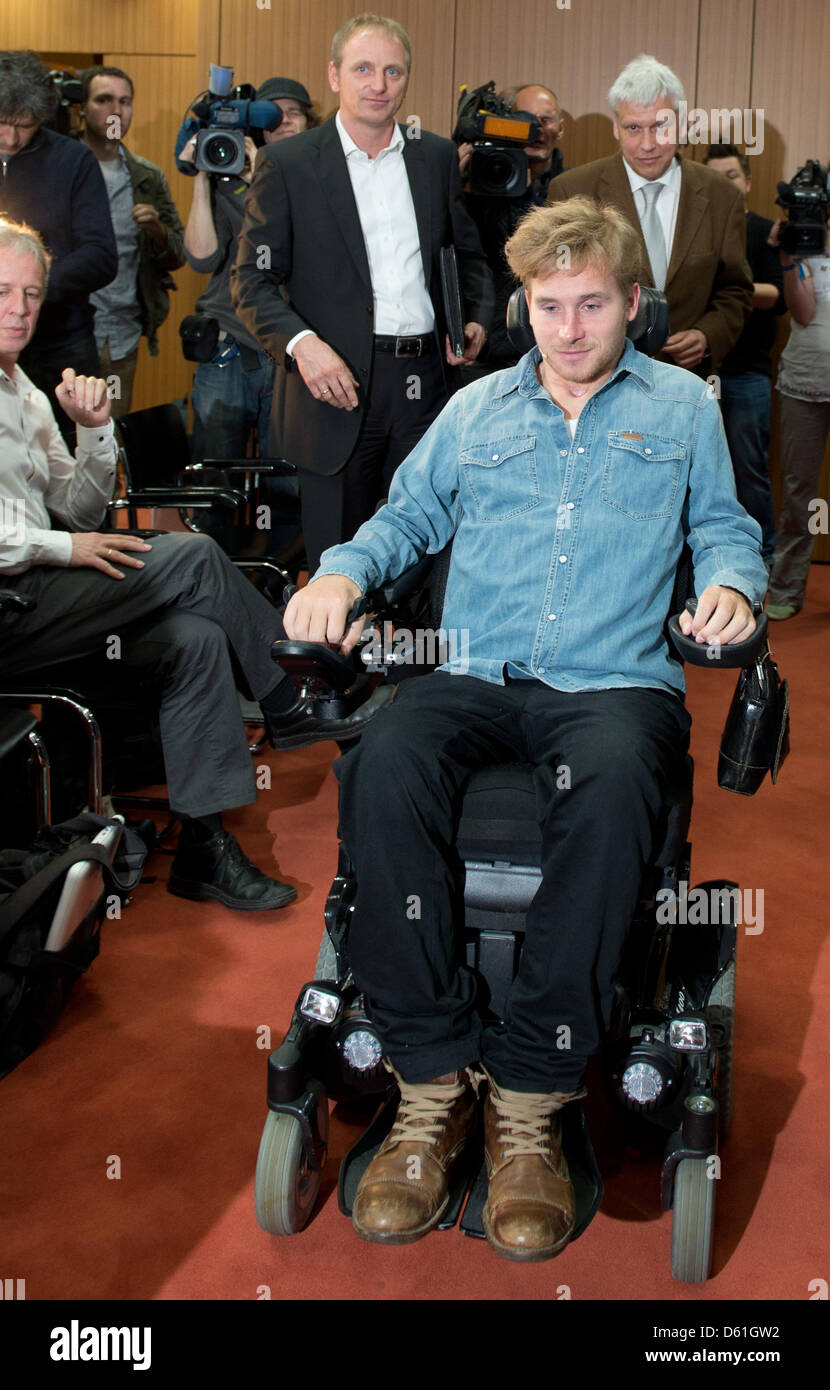 Author Samuel Koch (C) arrives for the presentation of his book 'Samuel ...