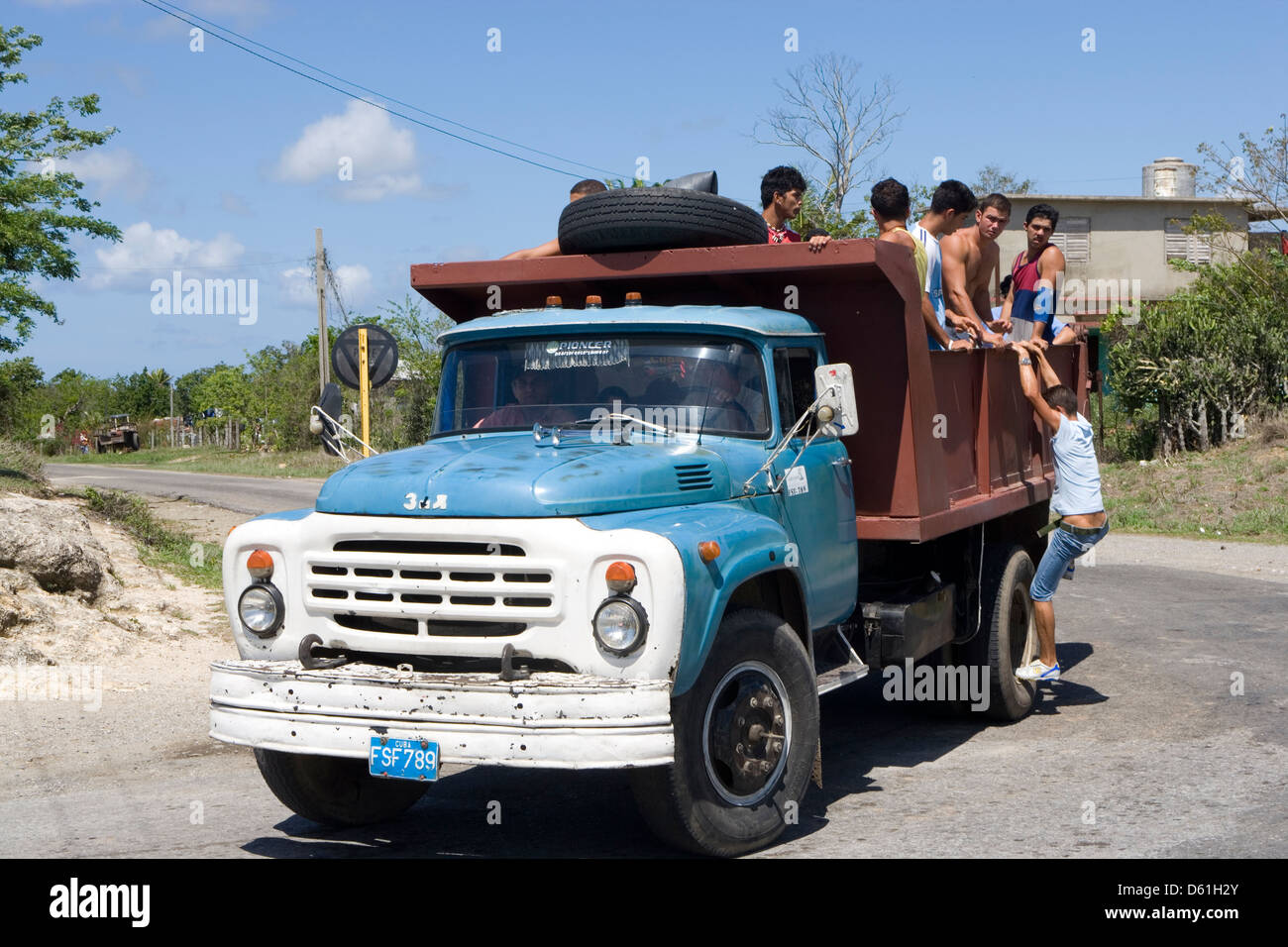 Cuba: travelling to work on truck Stock Photo - Alamy